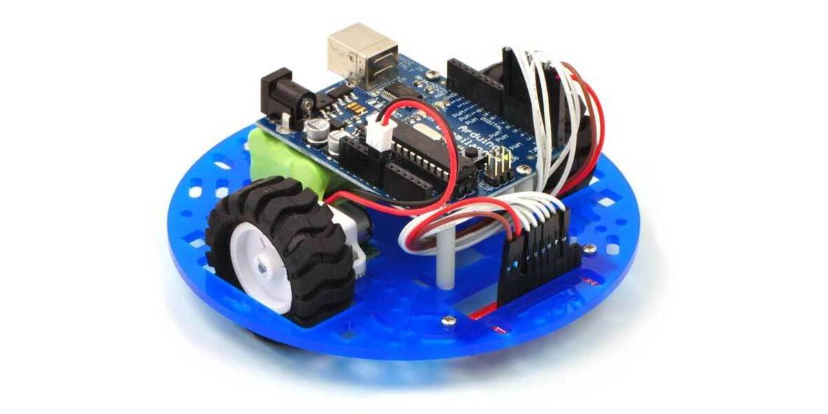 Pololu 5" round robot chassis RRC04A with an Arduino Duemilanove and a QTR sensor array.